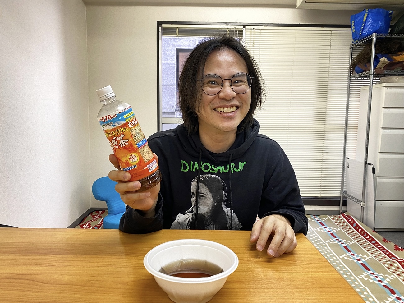 We try a half-drunk bottle of tea that’s been sitting on the balcony ...