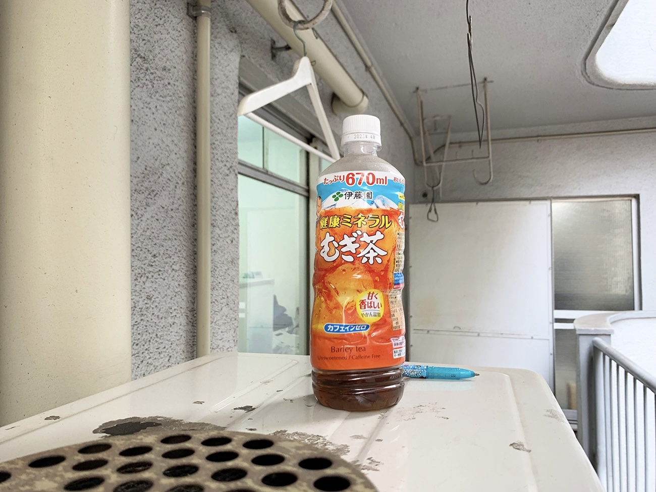 We try a half-drunk bottle of tea that’s been sitting on the balcony ...