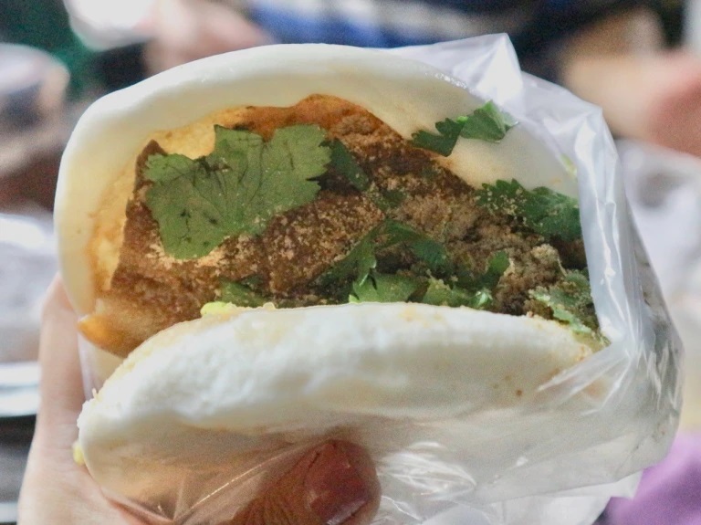 We tried gua bao pork belly buns in a local Taipei night market that’s ...