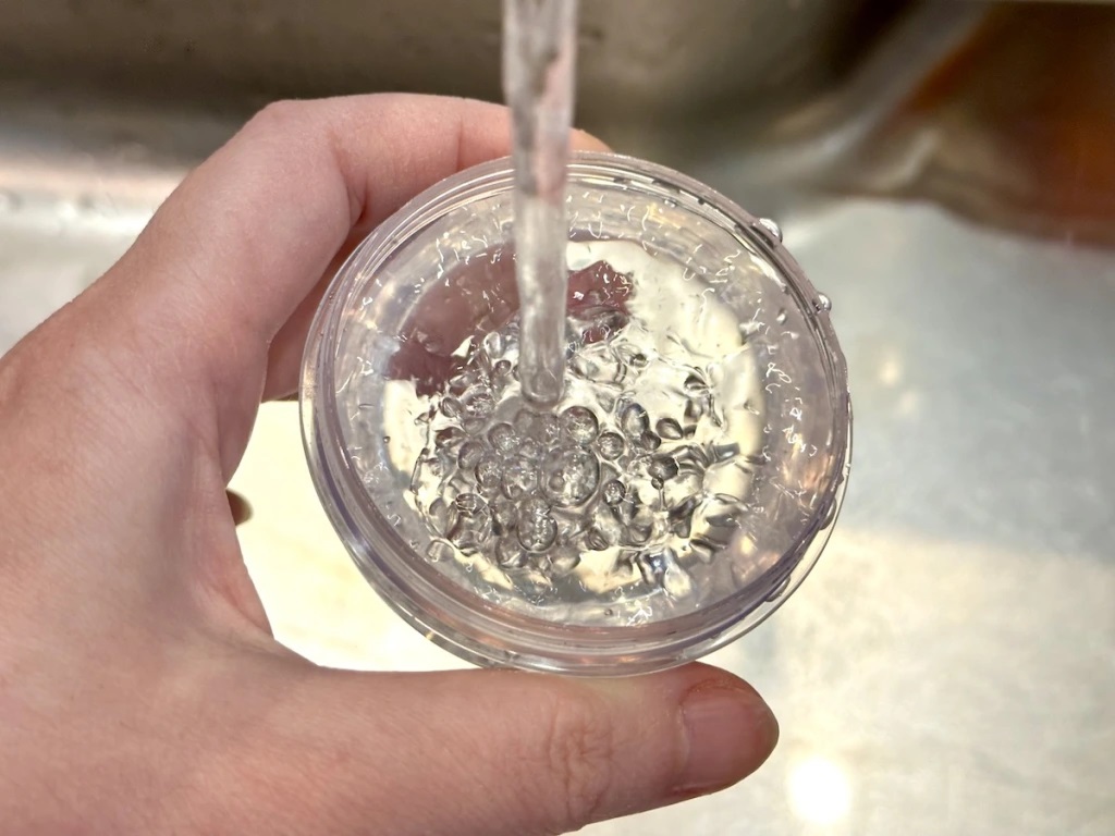 We got our paws on the real-kitty-litter snow globe, and here’s how it ...