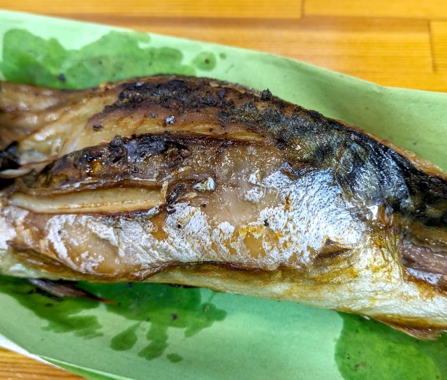 Mr. Sato is in fish heaven after tasting the freshly grilled mackerel ...