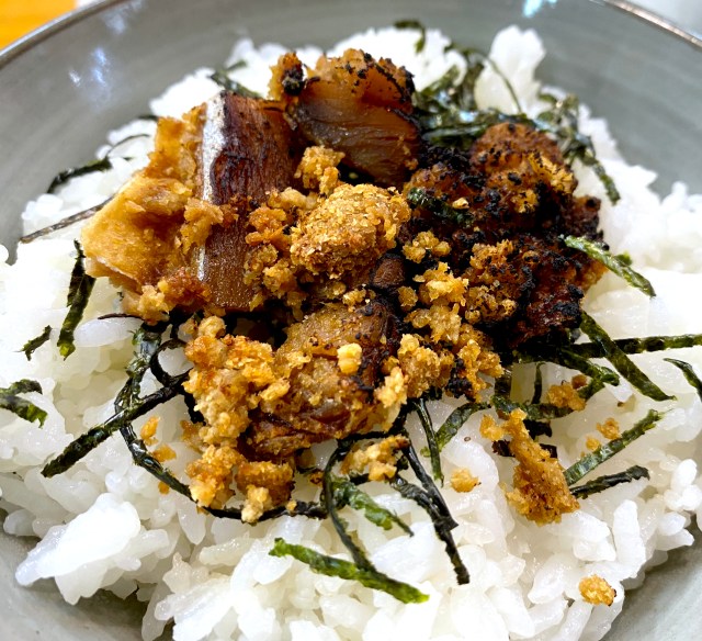 Mr. Sato is in fish heaven after tasting the freshly grilled mackerel ...