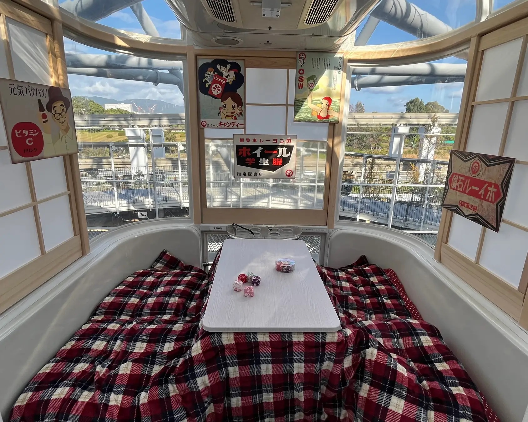 Japan’s tallest Ferris wheel adds kotatsu and hot sake service for a warm way to chill in the ...