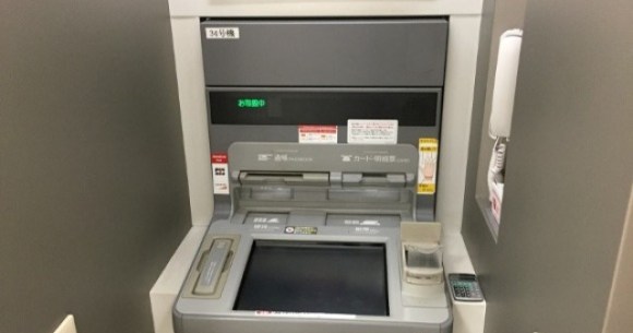 Japan’s new ATMs automatically play anti-fraud videos to people talking ...