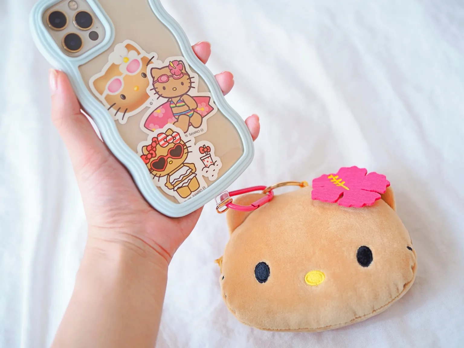 Hello Kitty becomes a suntanned beach babe for new magazine freebies in ...